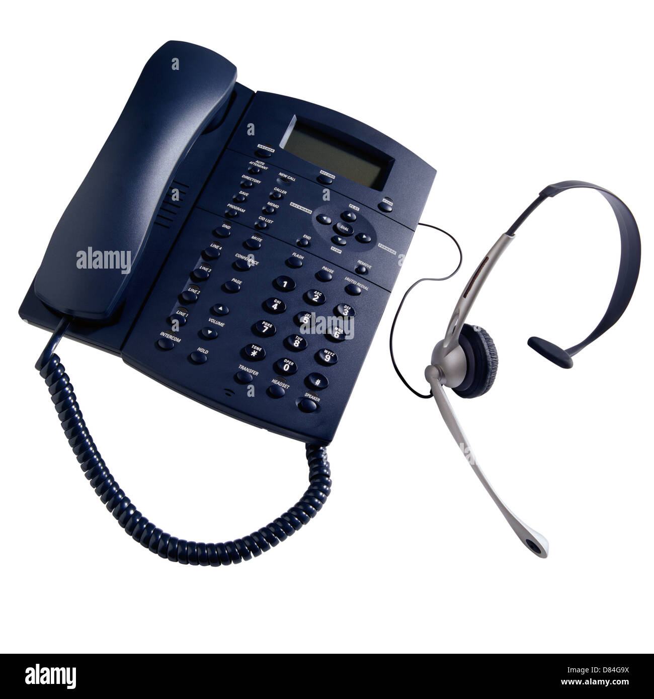 Office phone and headphones with microphone on a white background Stock ...