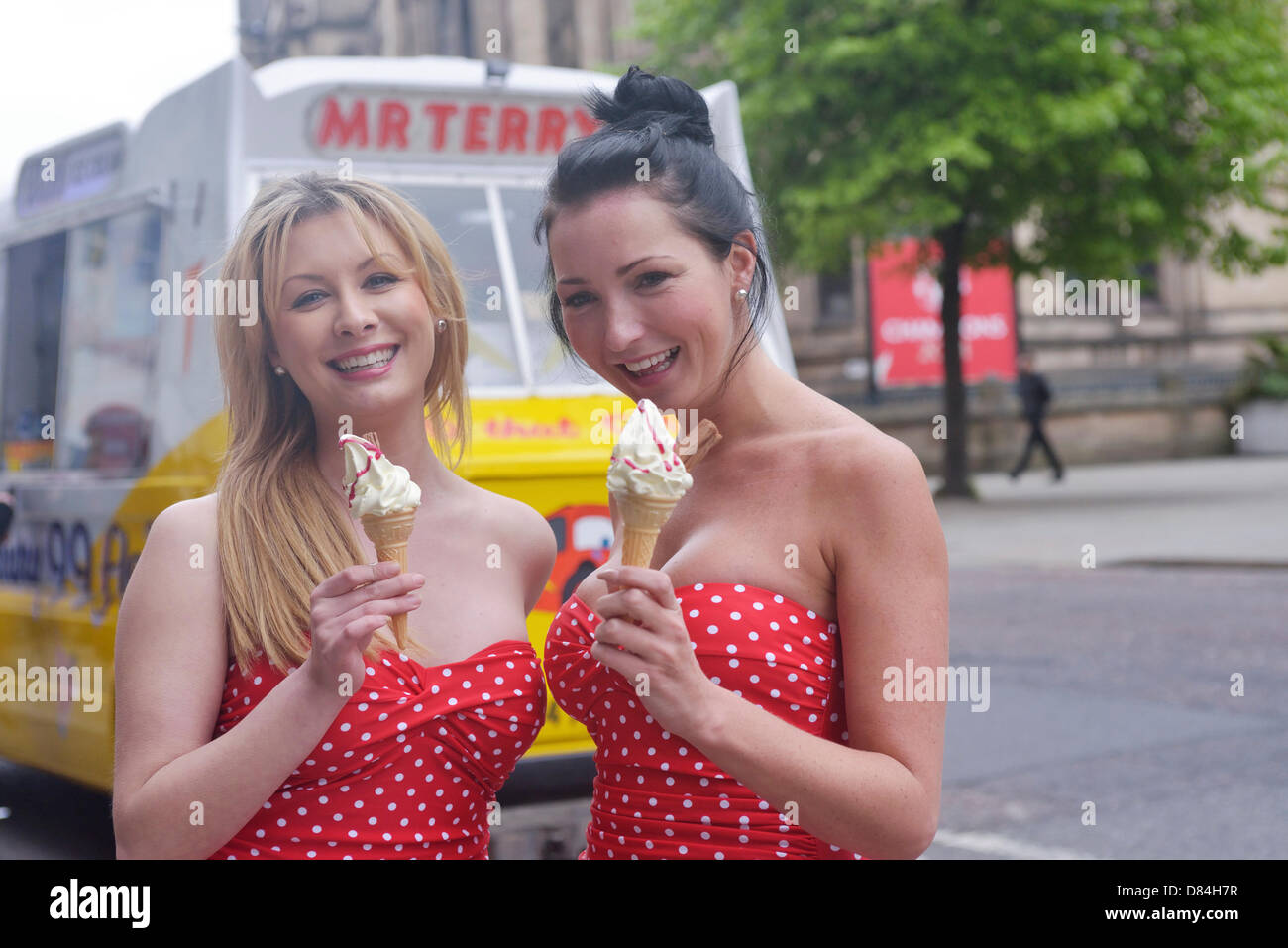 Natalie Kwan (left) and Sophie Wallace, staff from Virgin Money in Debenham's, Manchester are ...