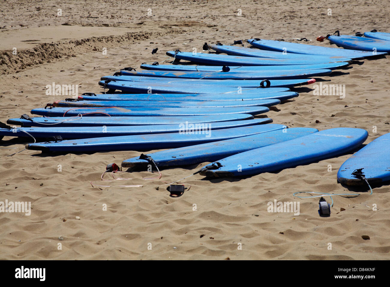surf boards on Bournemouth beach in May Stock Photo - Alamy