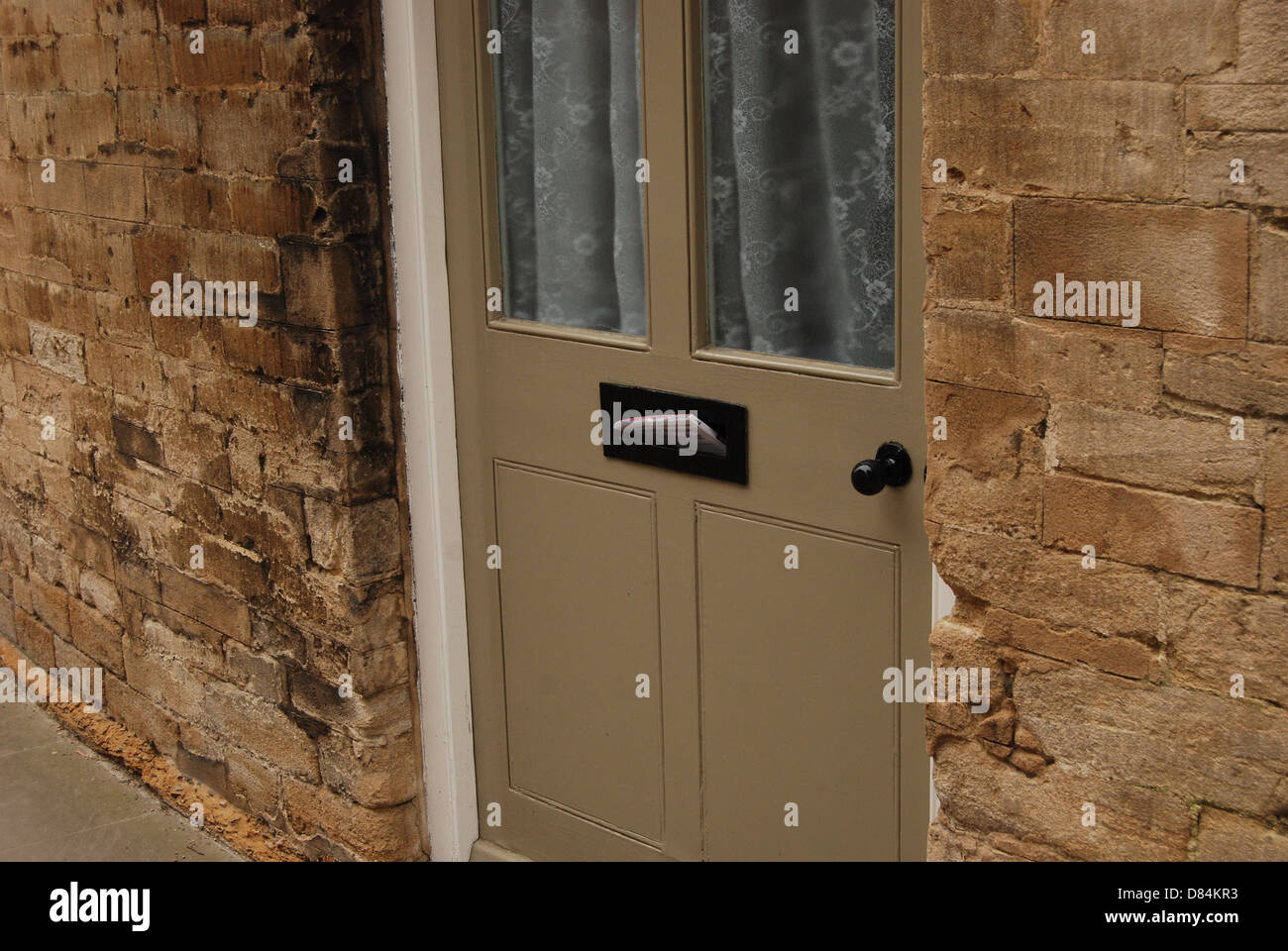 A front door in a small cotswold town Stock Photo - Alamy