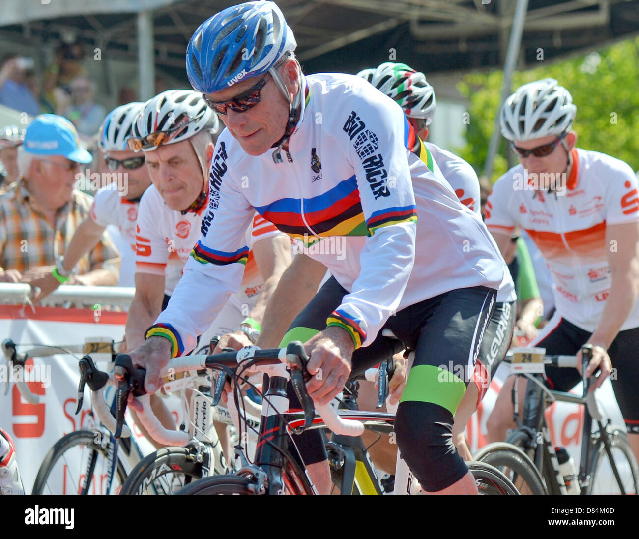 Former Road World Champion Rudi Altig (C) takes part in the race of the ...