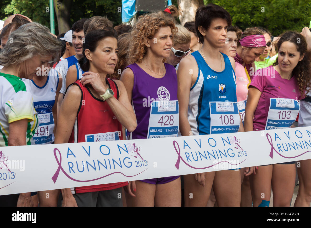 Milan, Italy - May 19, 2013: Thousands of women at the Avon running for ...