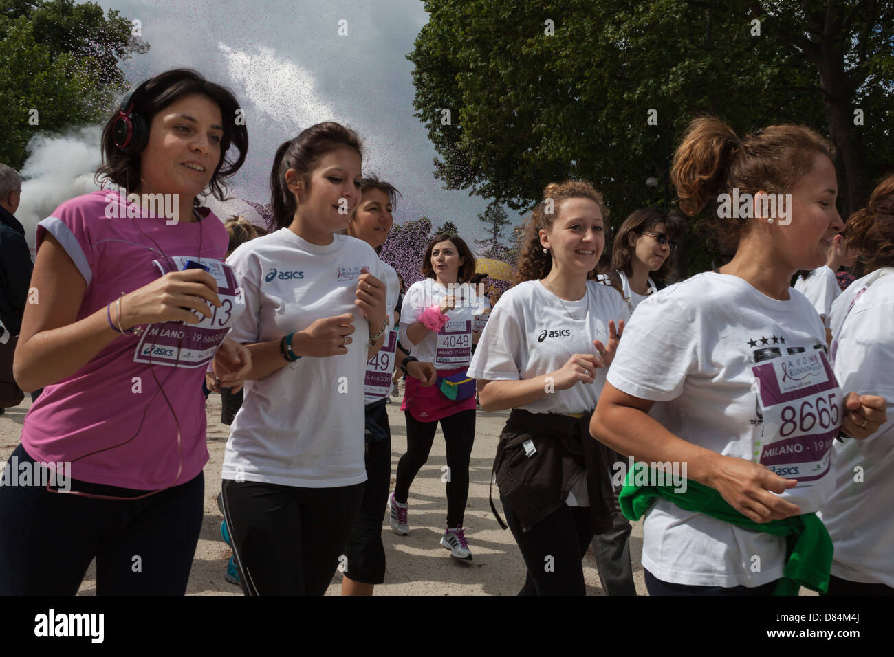 Milan, Italy - May 19, 2013: Thousands of women at the Avon running for ...