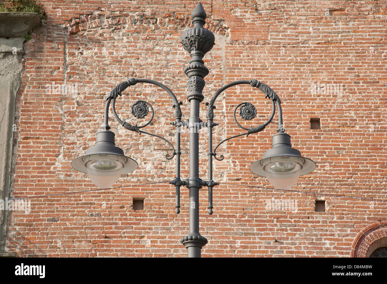 Lamppost on Facade in Pisa, Italy Stock Photo - Alamy