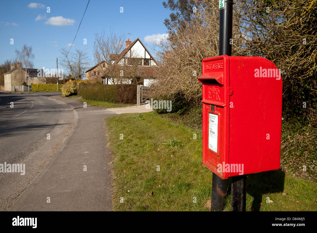 A red Village royal mail postbox mailbox, Swaffham Prior ...