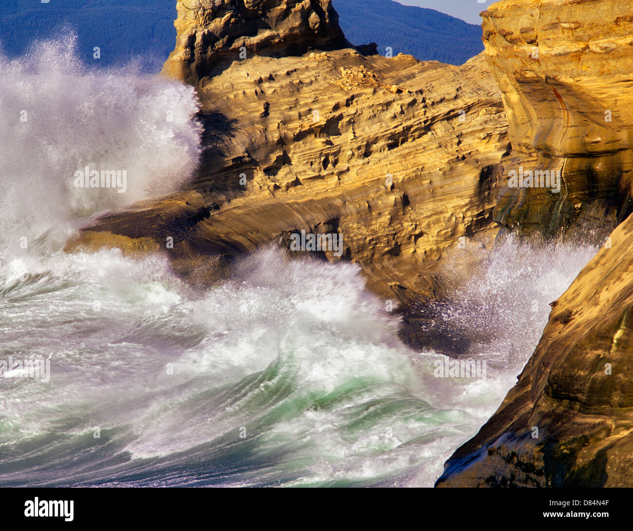 Cape Kiwanda with waves at sunset, Oregon Stock Photo - Alamy