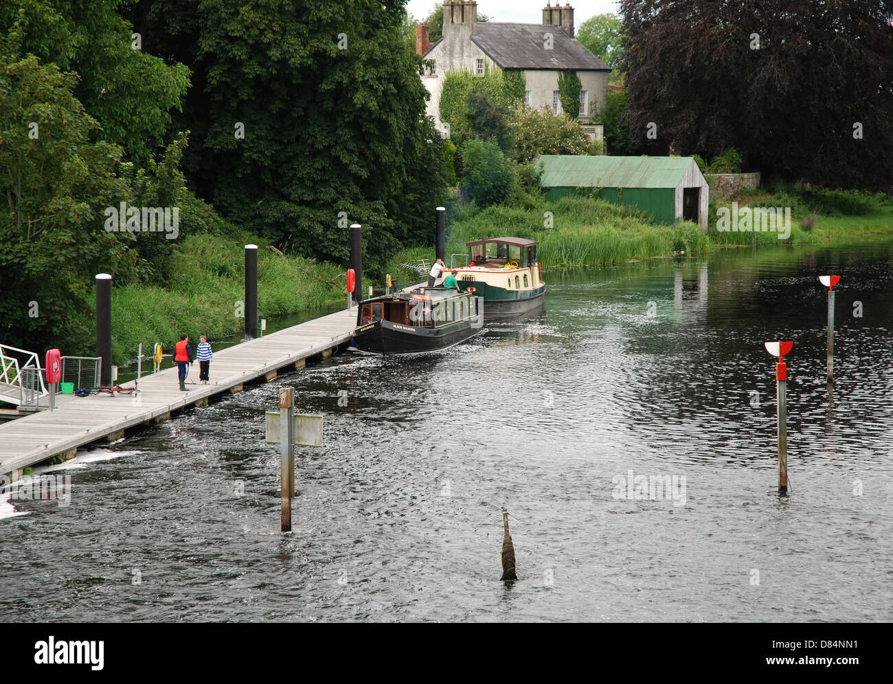 Barges moored at Belturbet Jetty on River Erne, Upper Lough Erne, Co ...