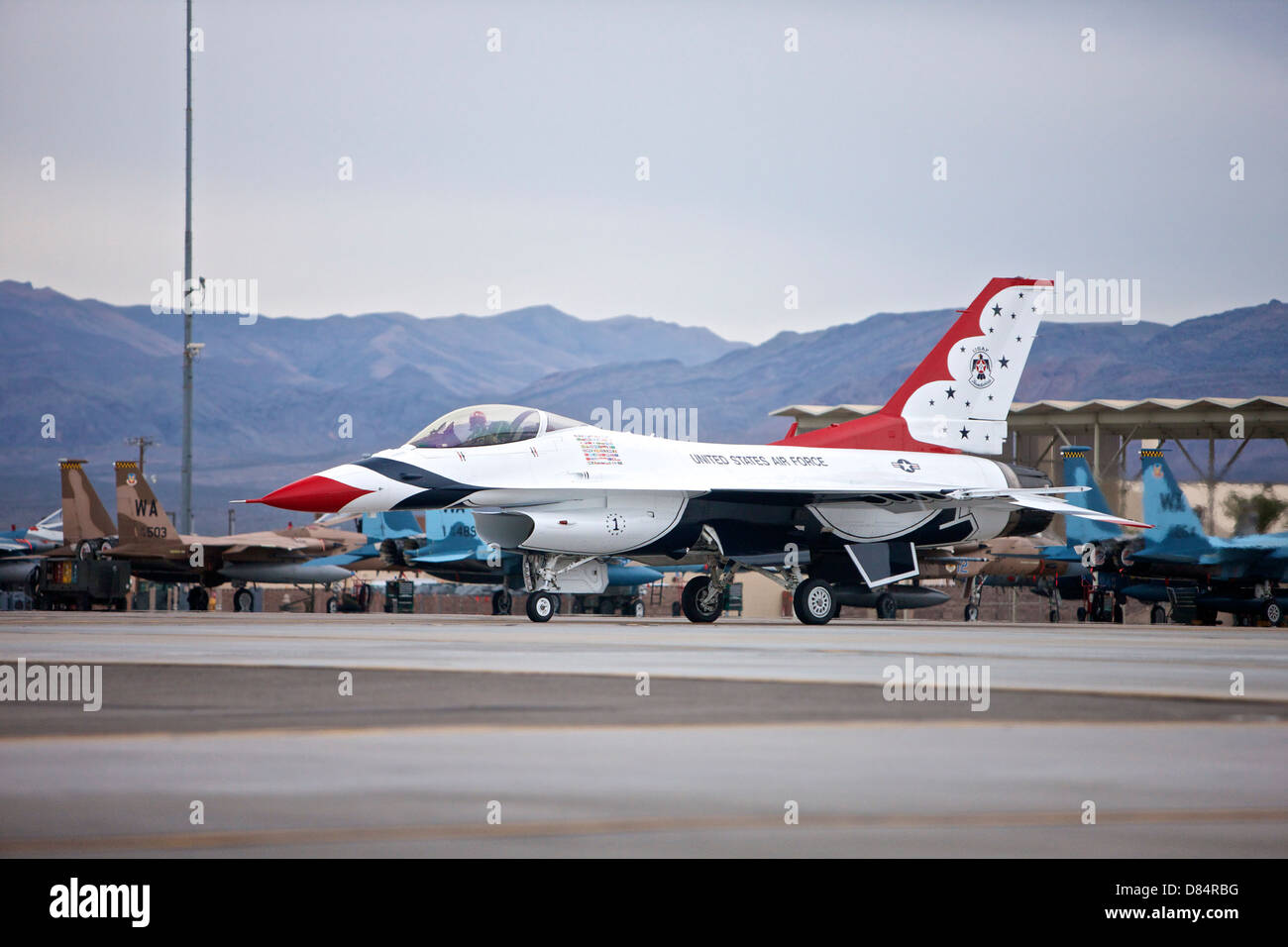 An F-16C Thunderbird taxis to the runway at Nellis Air Force Base ...
