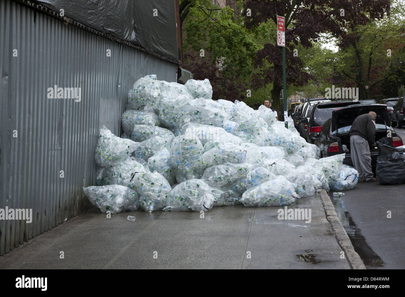 Empty bottles and cans for recycling at a beverage distributor that ...