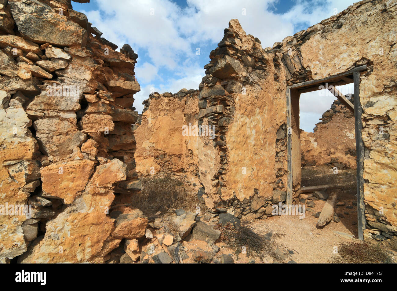 Old ancient building in the desert on a cloudy sky Stock Photo - Alamy