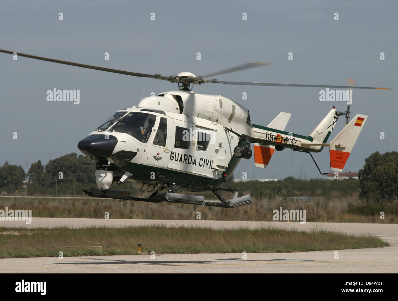 A BK117 utility helicopter of the Spanish Civil Guard, landing in Rota ...