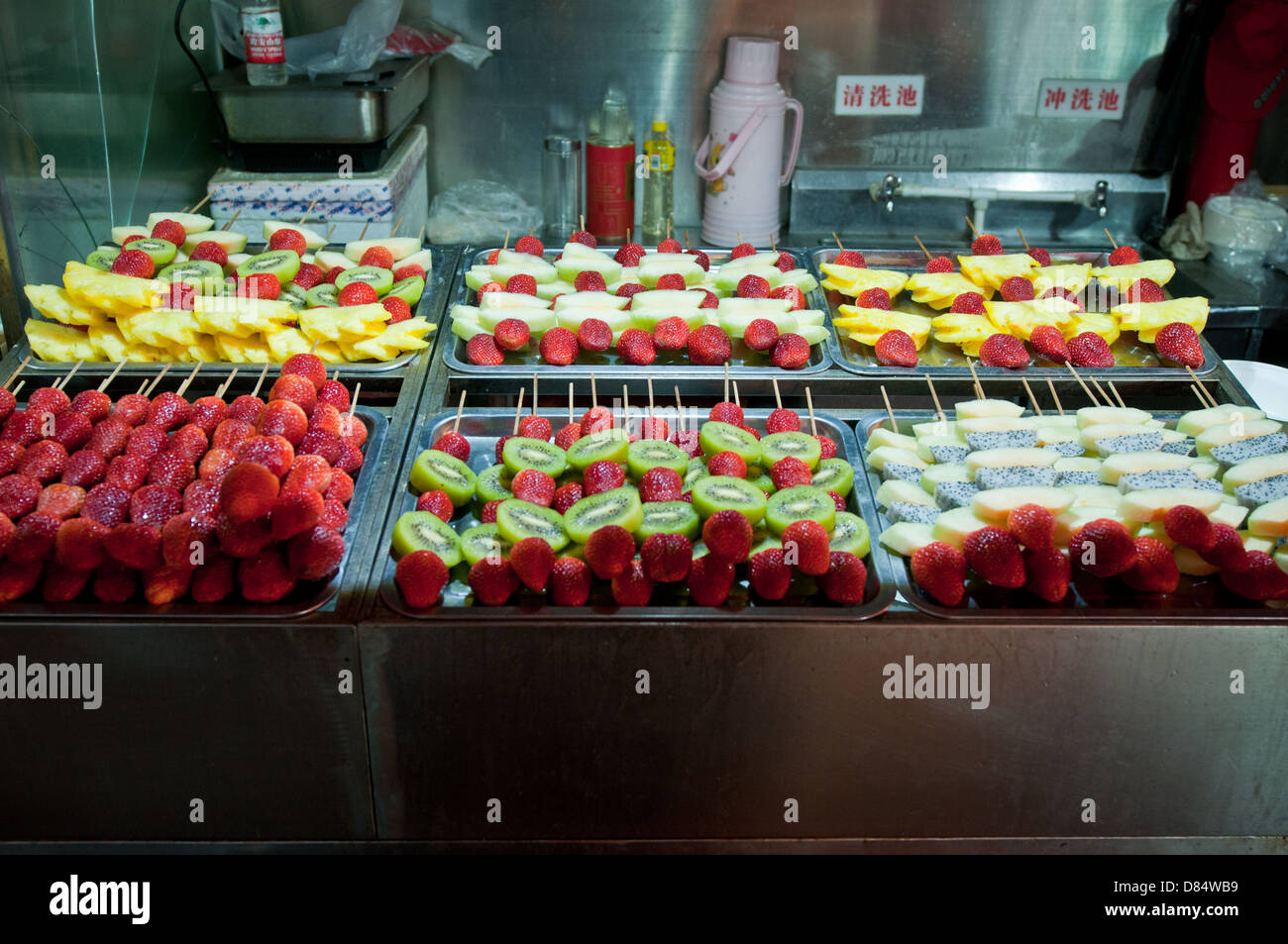 sticked fruits (Tanghulu or bingtanghulu) on food stall at Wangfujing ...