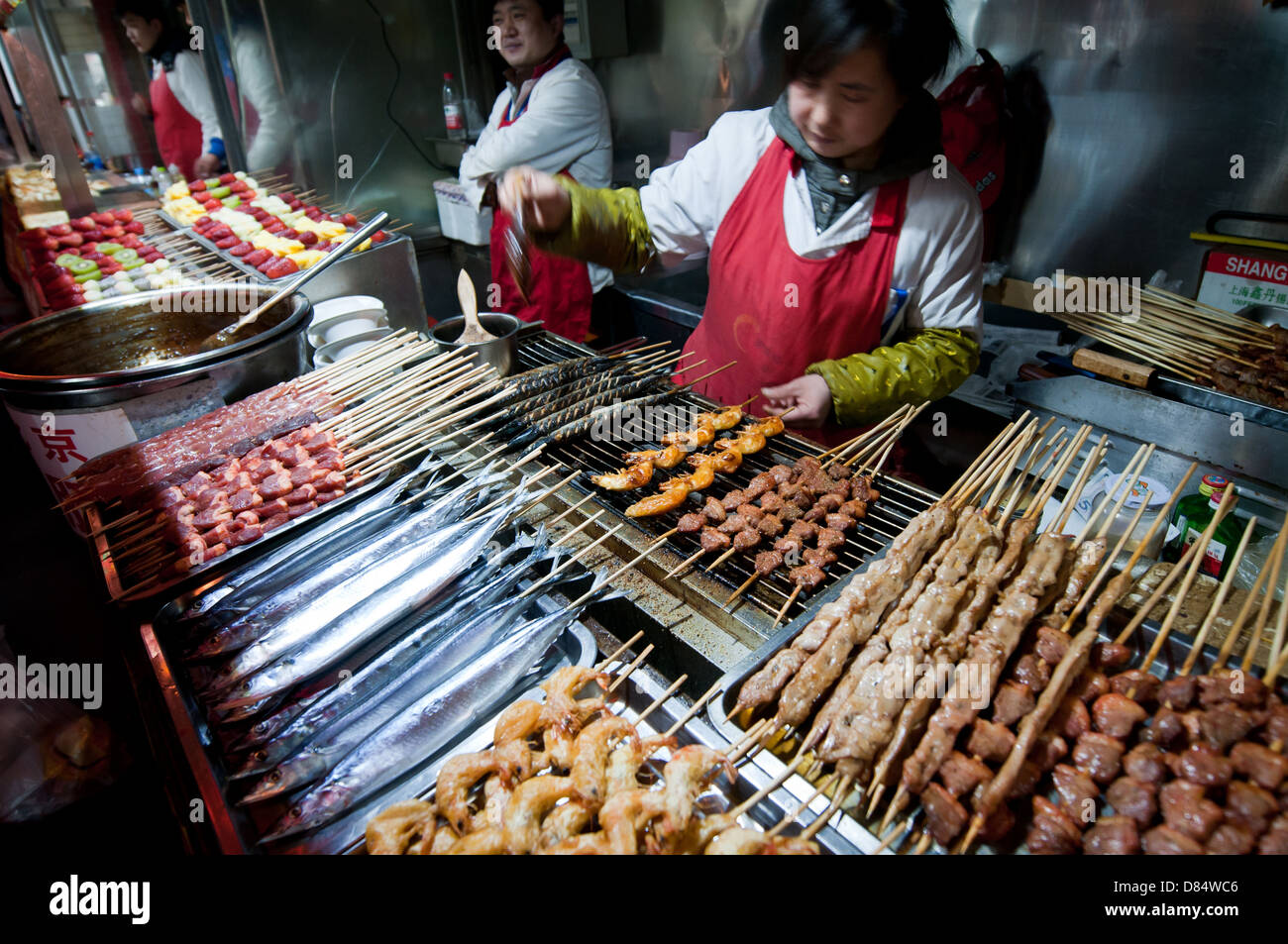food stall with different kind of skewers at Wangfujing Snack Street in ...