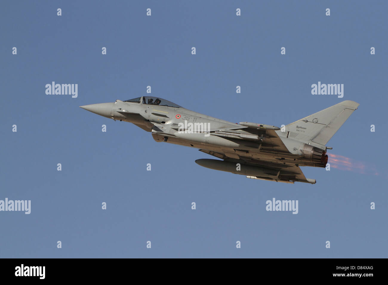 A Eurofighter Typhoon of the Italian Air Force taking off during an ...