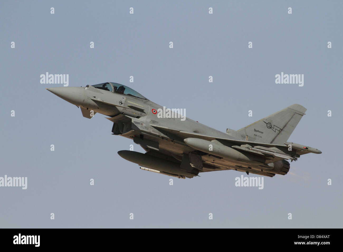 A Eurofighter Typhoon of the Italian Air Force taking off during an ...