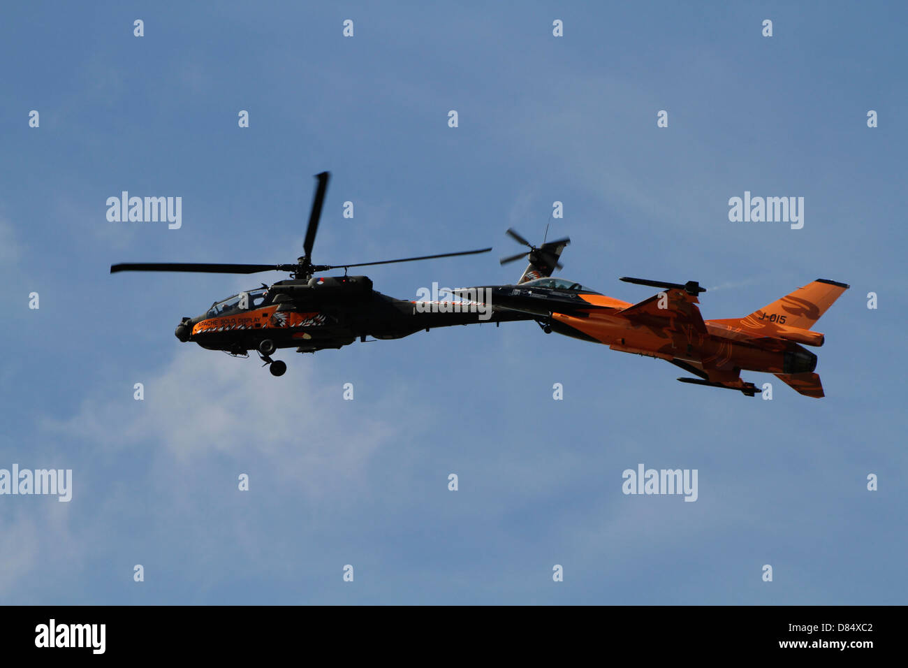 An F-16 Falcon and AH-64 Apache from the Royal Netherlands Air Force ...