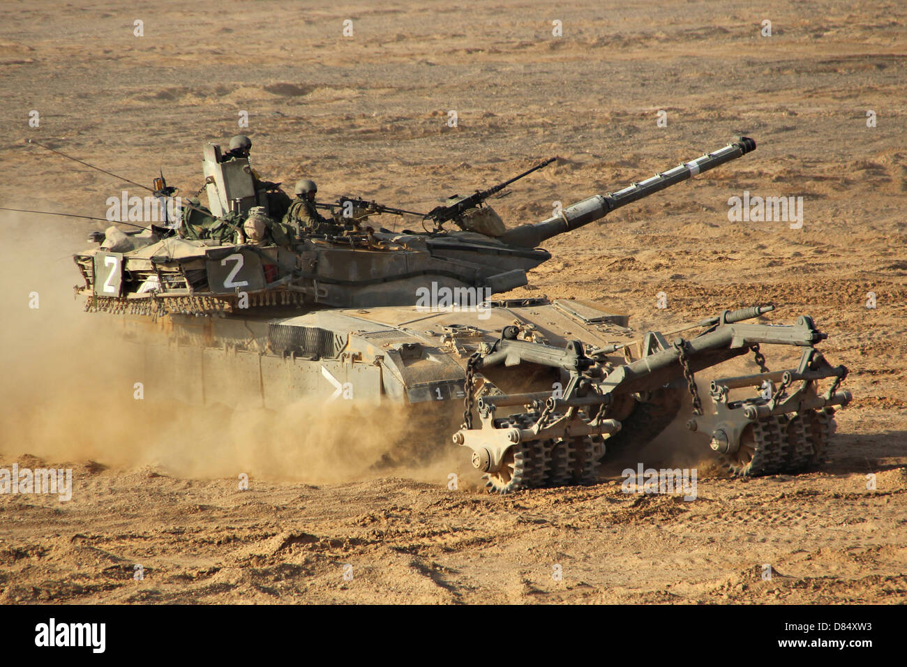 An Israel Defense Force Merkava Mark II battle tank with mine clearing ...