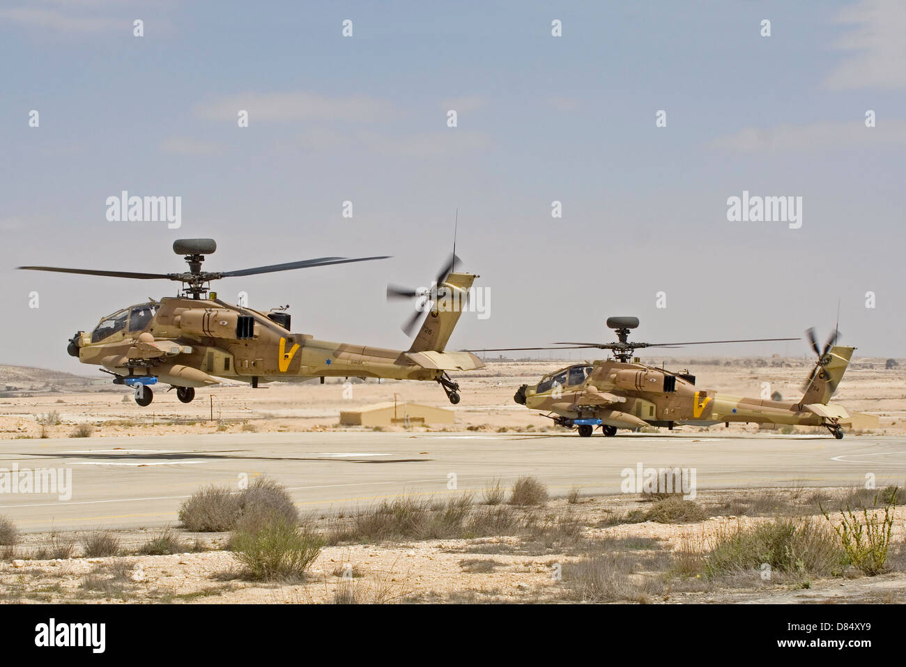 A pair of AH-64D Saraf attack helicopters of the Israeli Air Force ...