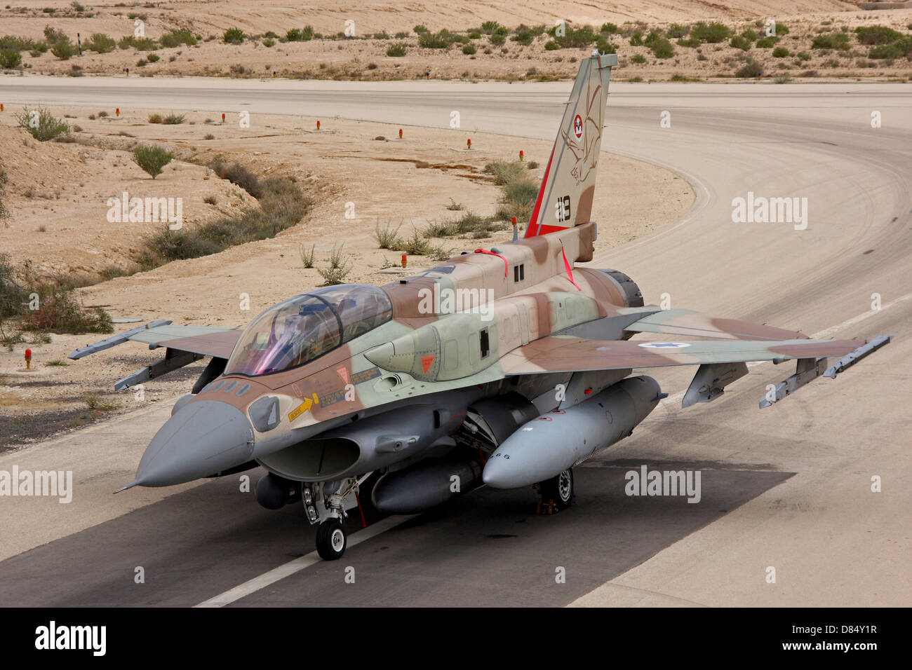 An F-16I Sufa of the Israeli Air Force taxis back to a hardened shelter at Ramon Air Force Base ...