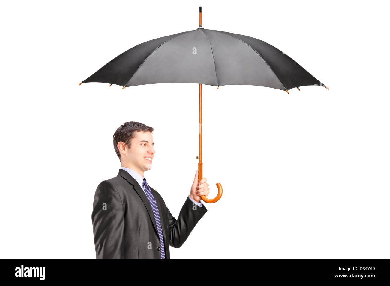 Man holding an umbrella isolated on white background Stock Photo - Alamy
