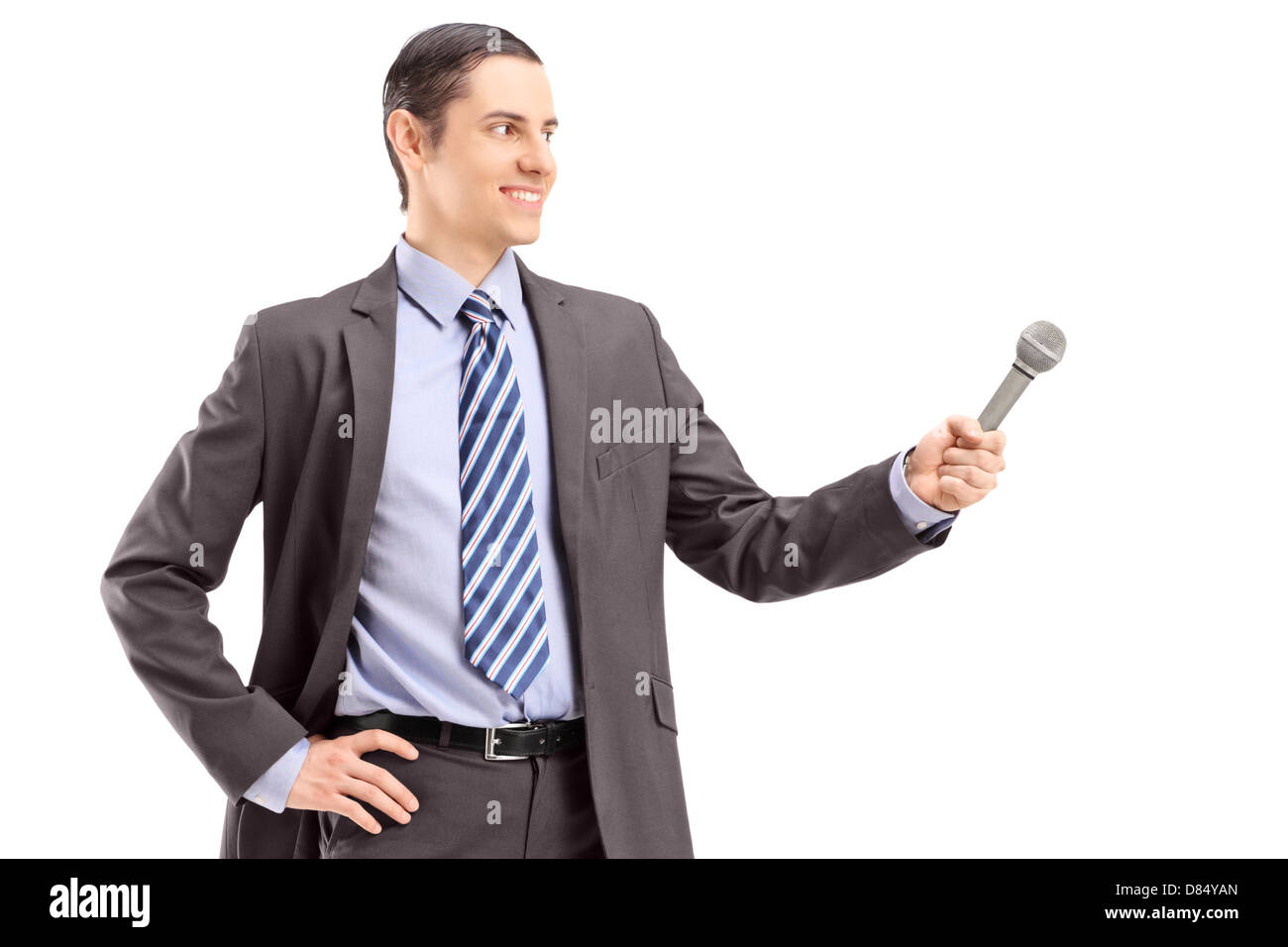 Professional male reporter holding a microphone, isolated on white ...