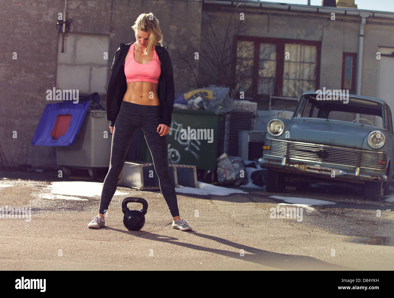 Ghetto girl with kettlebell in a crossfit training outdoor Stock Photo ...