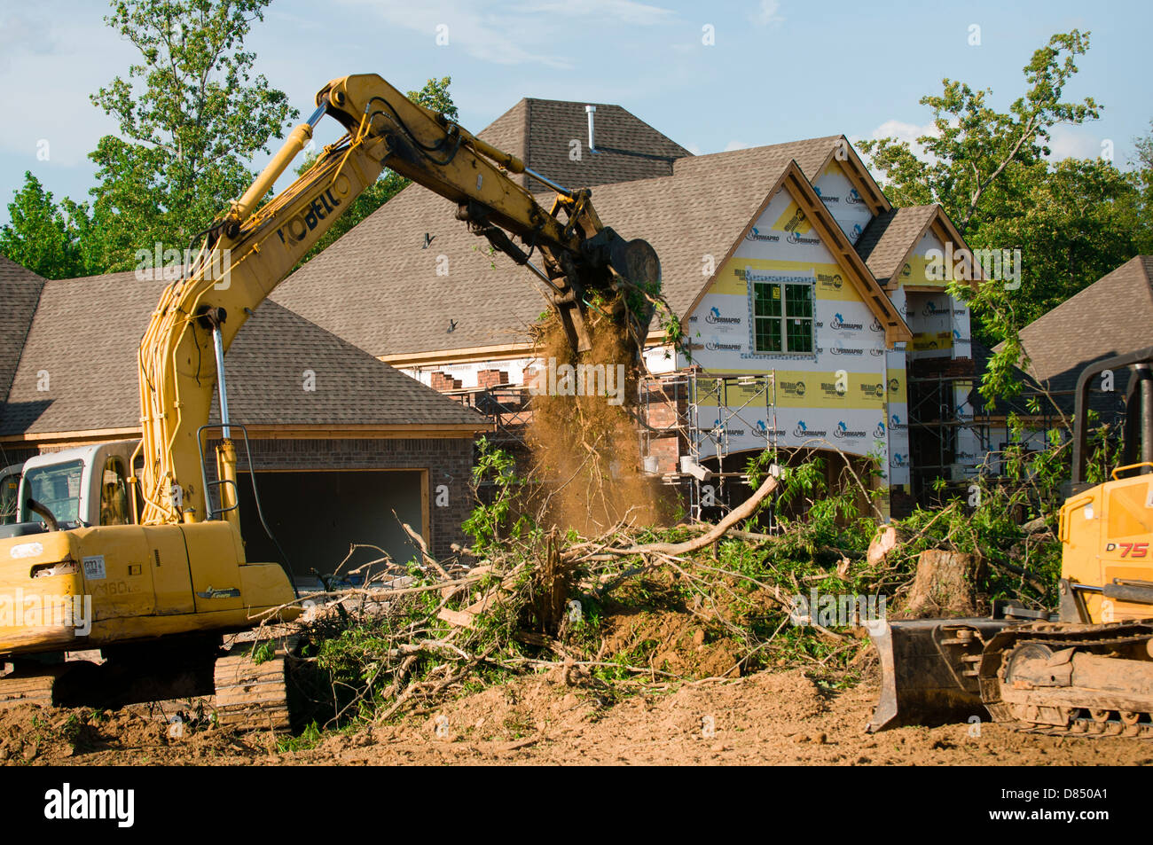 Empty lot backhoe hi-res stock photography and images - Alamy