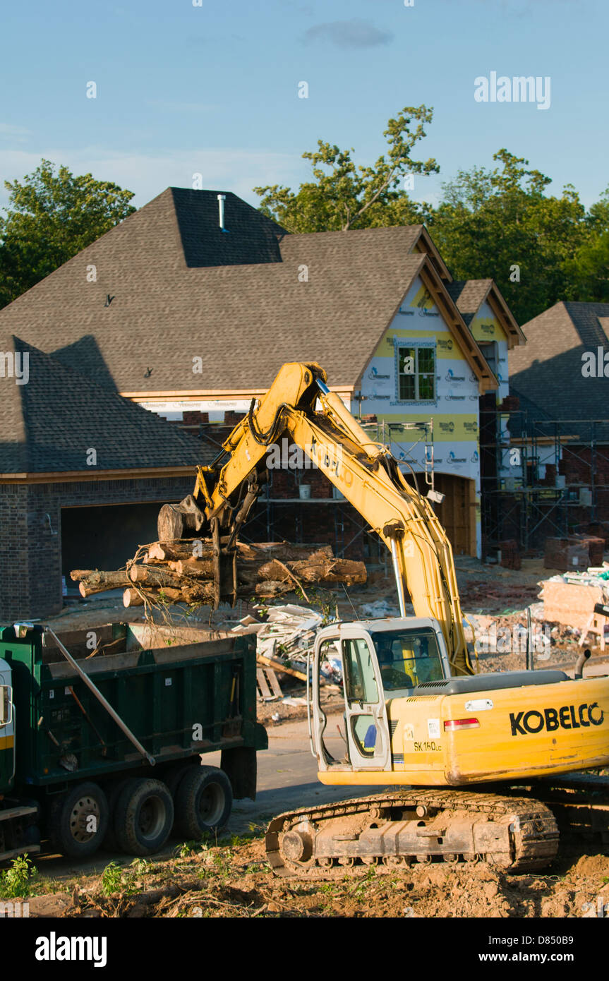 Empty lot backhoe hi-res stock photography and images - Alamy