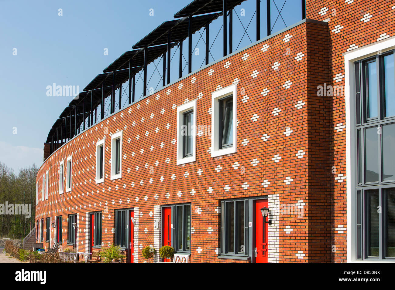Houses in Almere with solar PV panels on the roof Stock Photo - Alamy