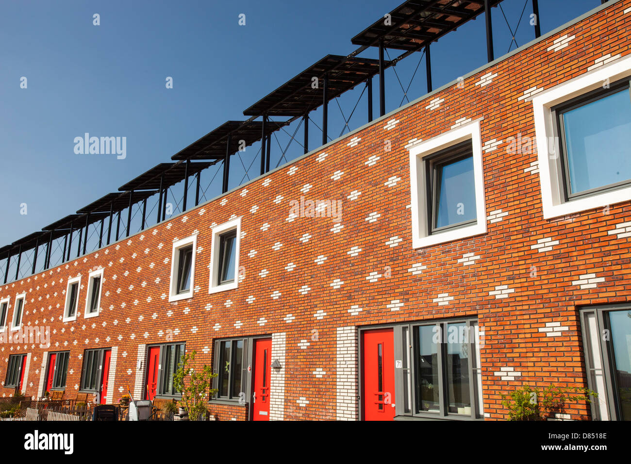 Houses in Almere with solar PV panels on the roof Stock Photo - Alamy