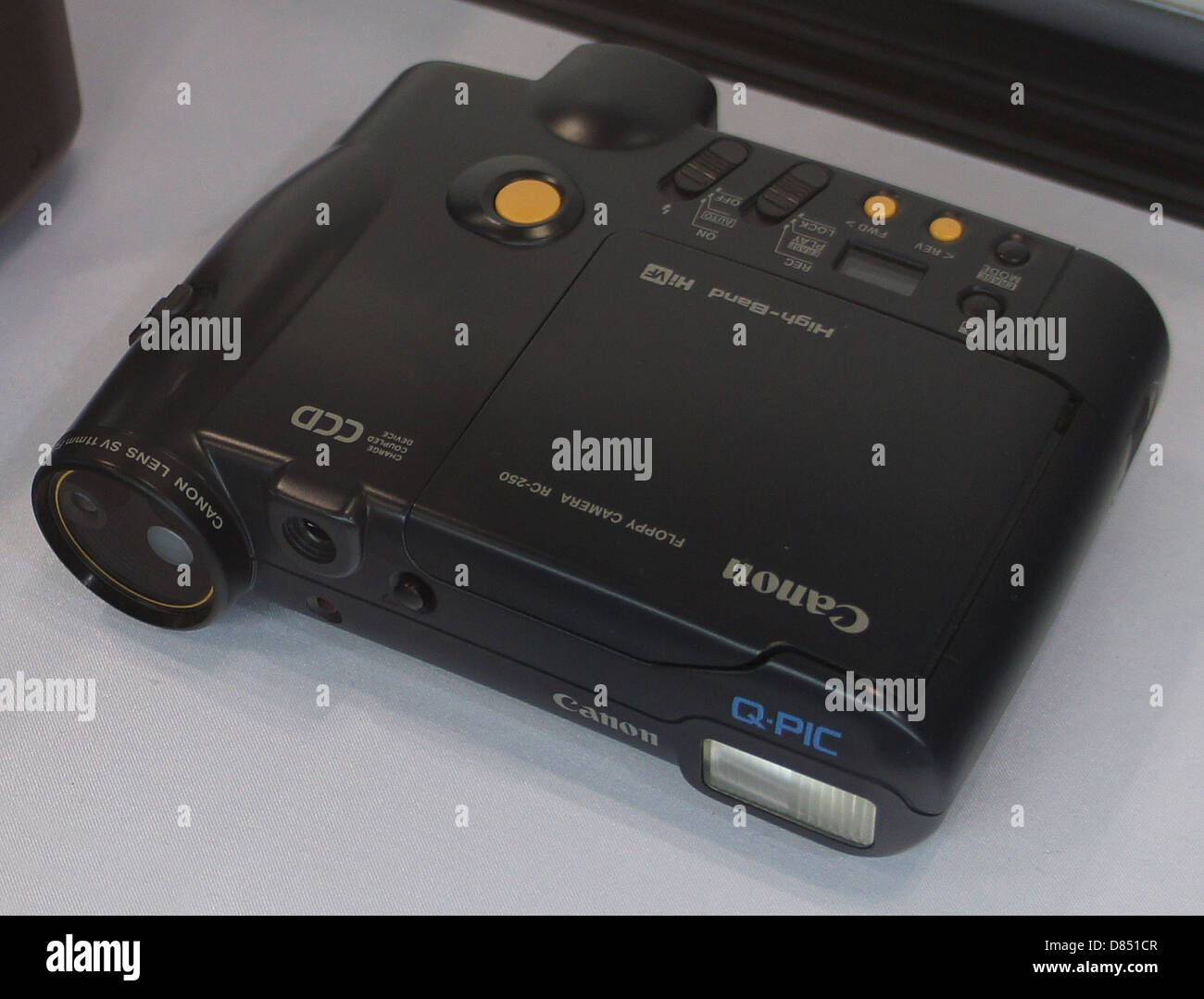 A stock photo of the Canon Q-Pic RC-250 CP, a portable photo printer ...