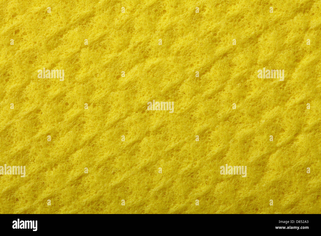 Yellow washing sponge texture hi-res stock photography and images - Alamy