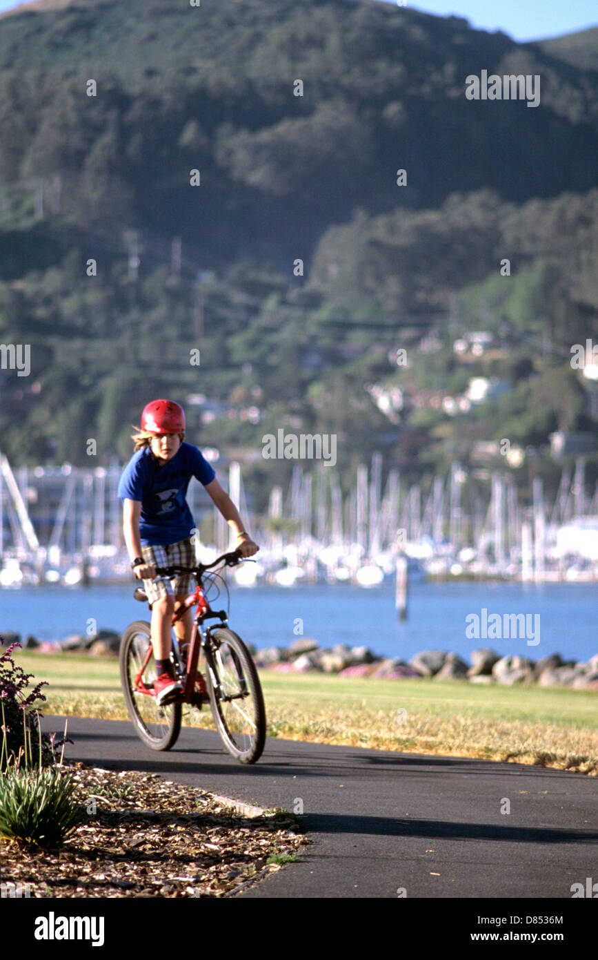 teenage boy riding mountain bike on bike path in Marin County with ...