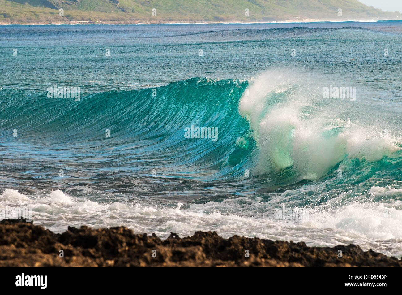 Wave breaking on lava shelf, Oahu, Hawaii Stock Photo - Alamy