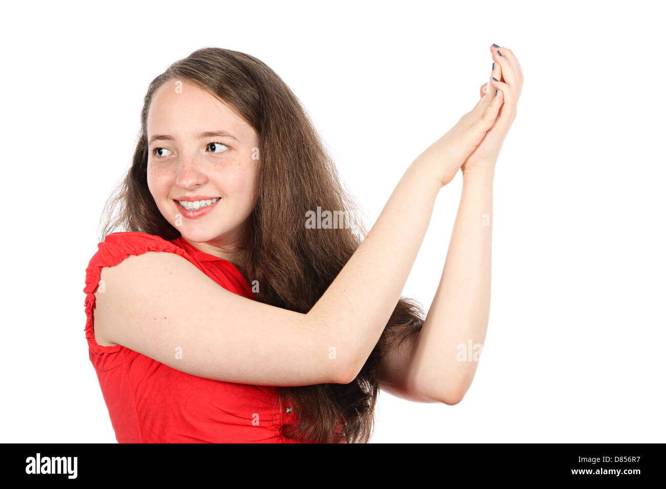 The girl in motion, gesturing by hands. Isolated on white Stock Photo ...