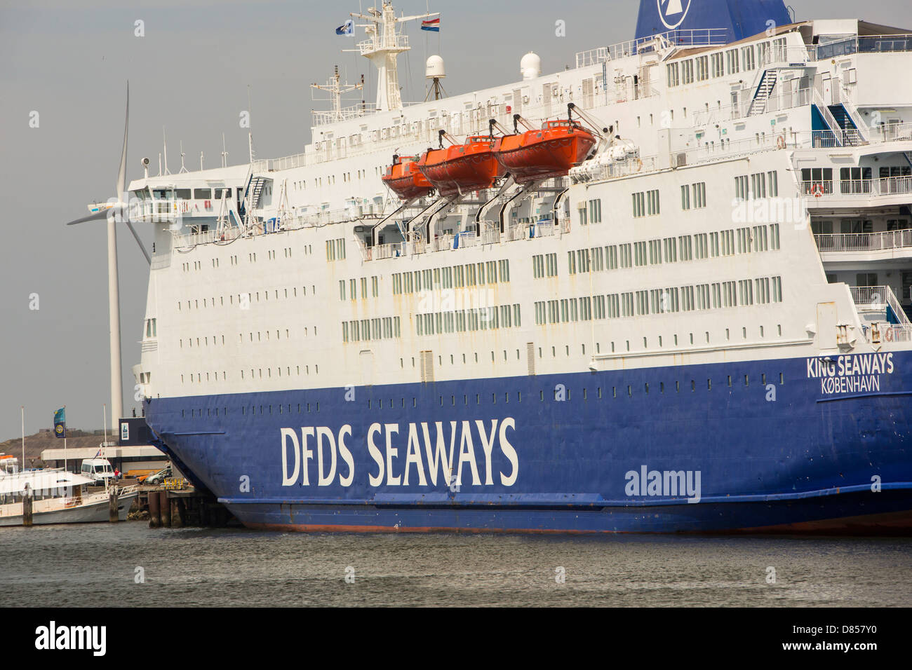 A DFDS, Newcastle/Amsterdam ferry in Ijmuiden port with a wind turbine ...