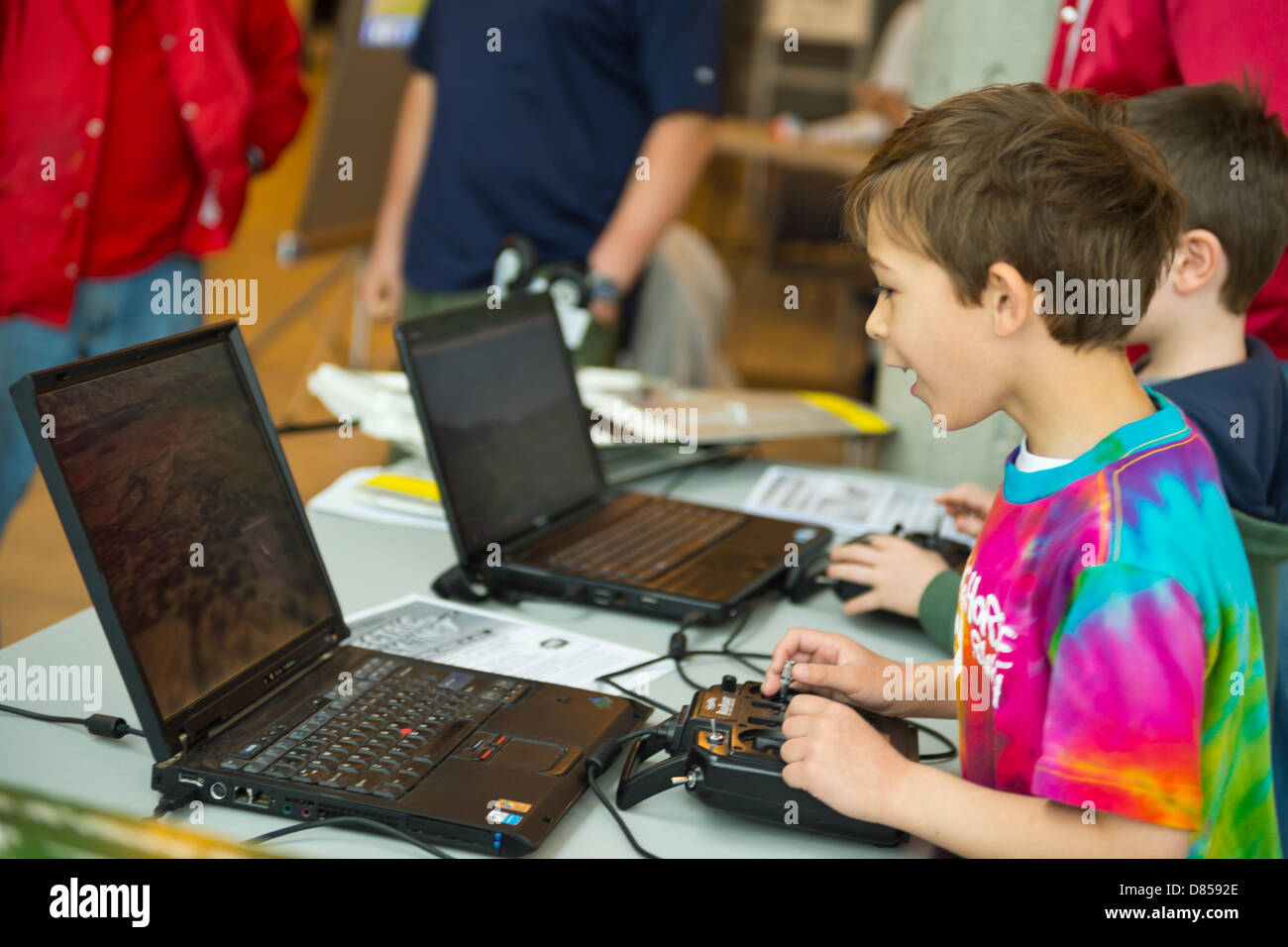 Garden City, New York, USA. 19th May 2013. Two young boys use remote ...
