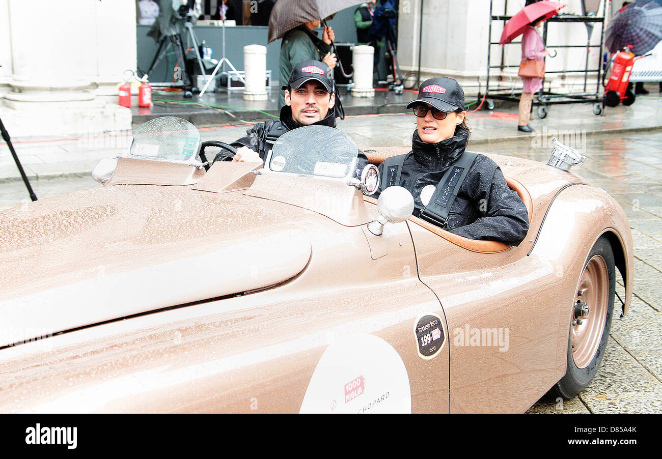 Supermodel David Gandy with Yasmin Le Bon taking part in a very wet ...