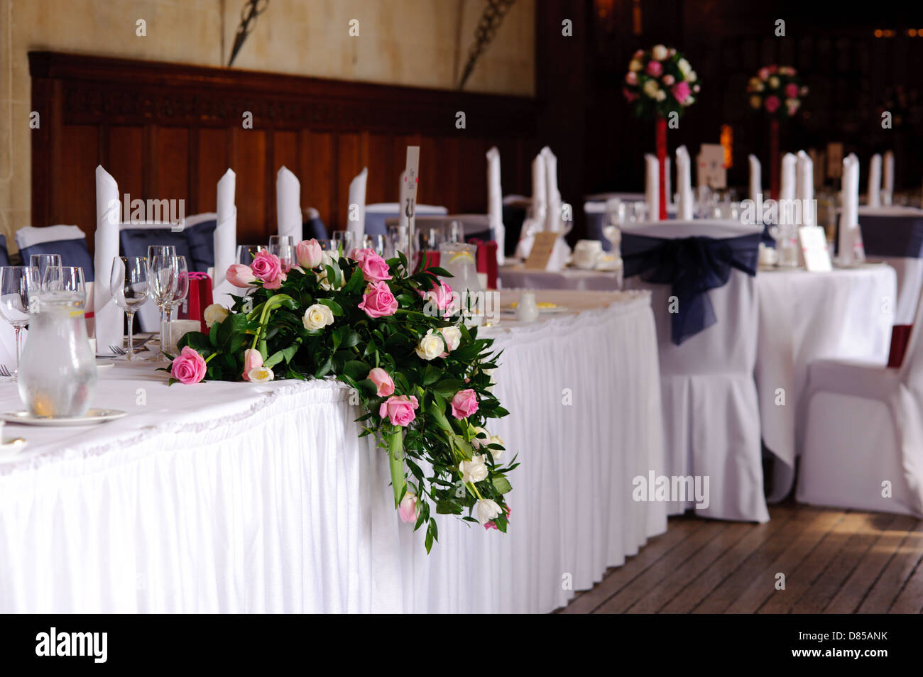 Tables decorated with flowers at a wedding reception Stock Photo - Alamy