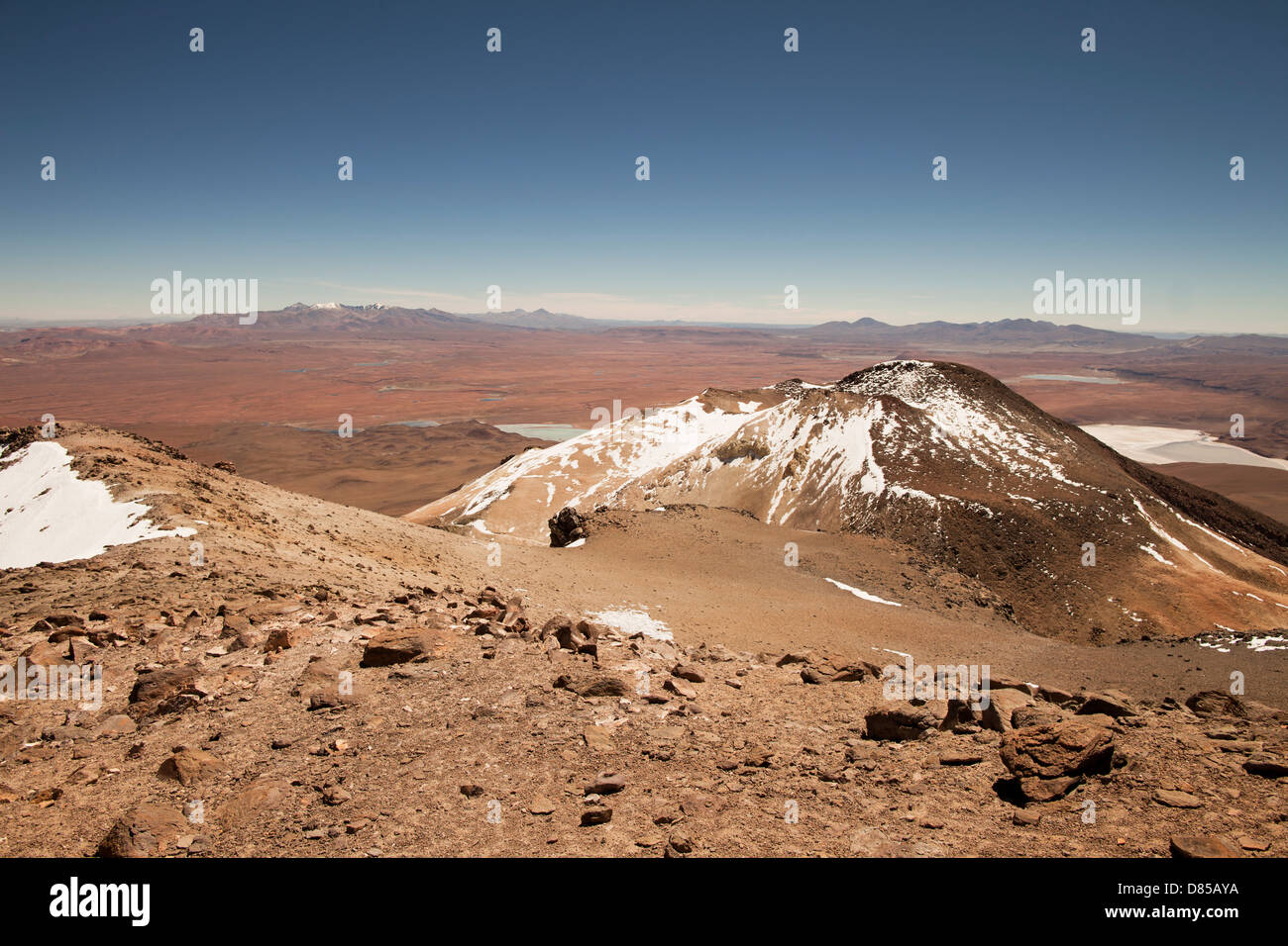 The view from the snow-capped summit of the Uturunku Stratovolcano at ...
