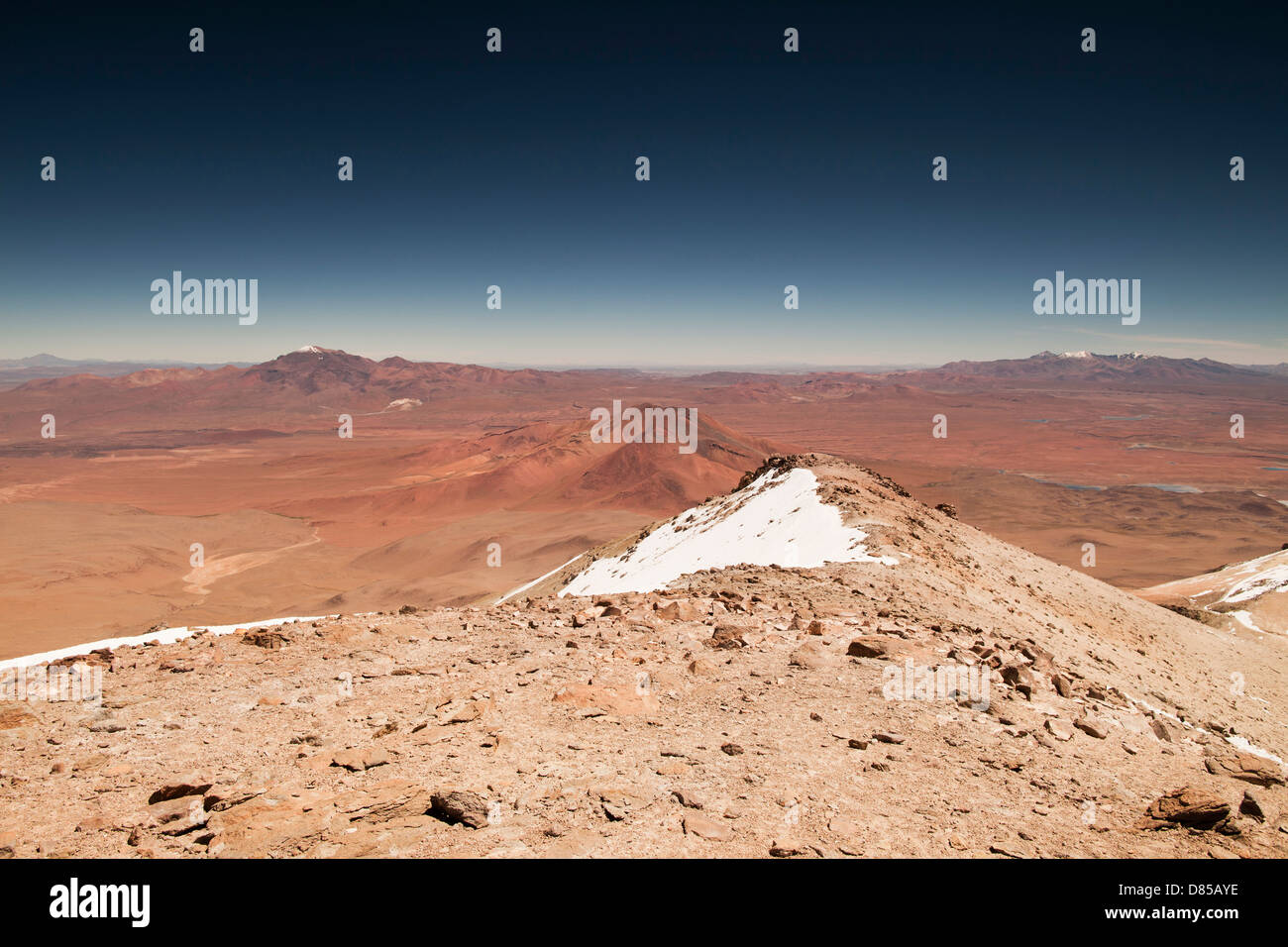 The view from the snow-capped summit of the Uturunku Stratovolcano at ...
