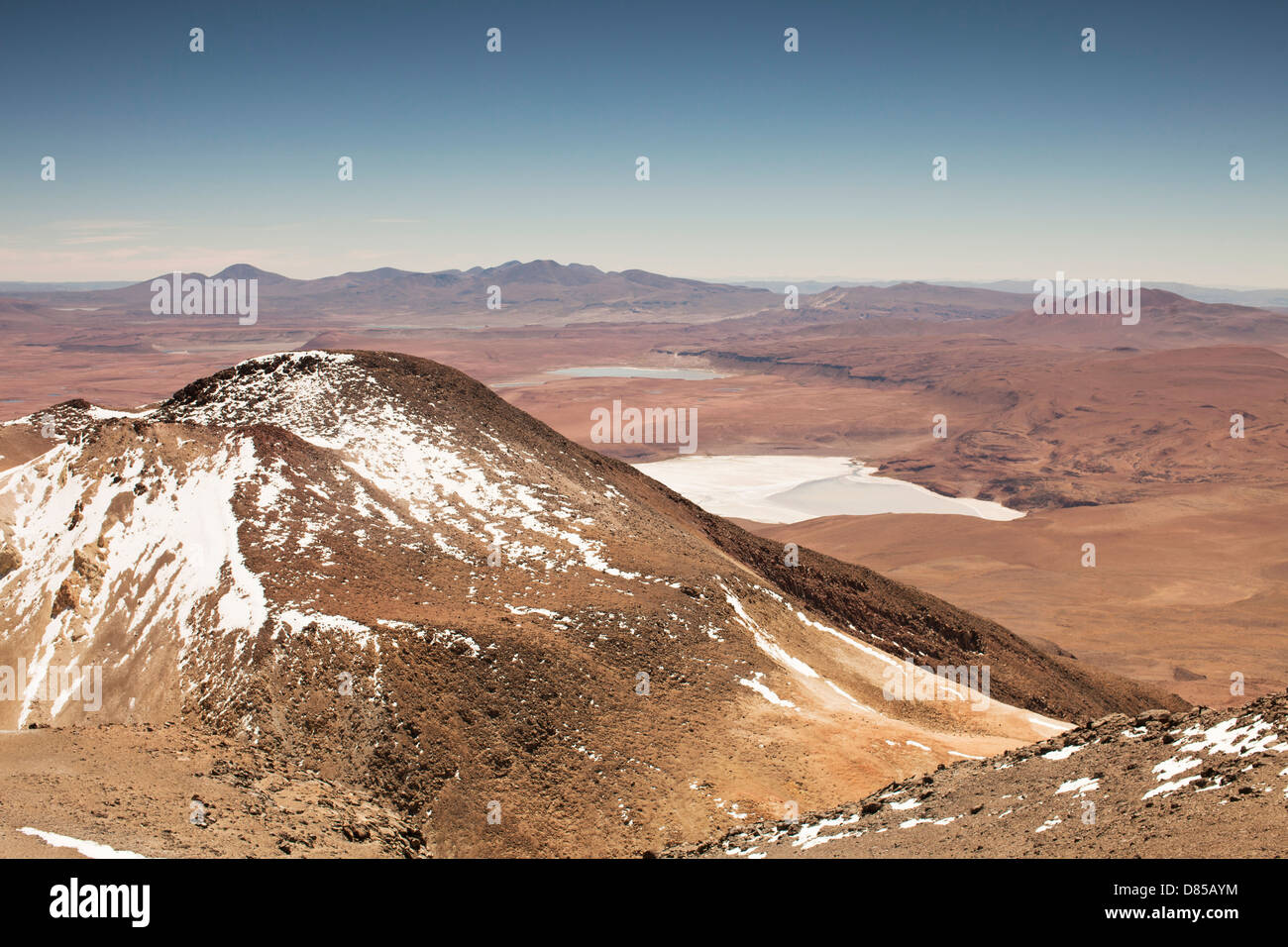 The view from the snow-capped summit of the Uturunku Stratovolcano at ...