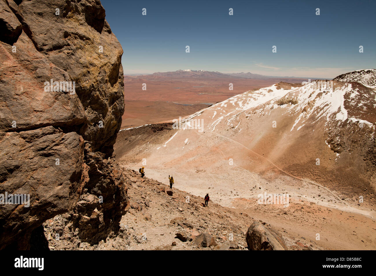The view from the snow-capped summit of the Uturunku Stratovolcano at ...