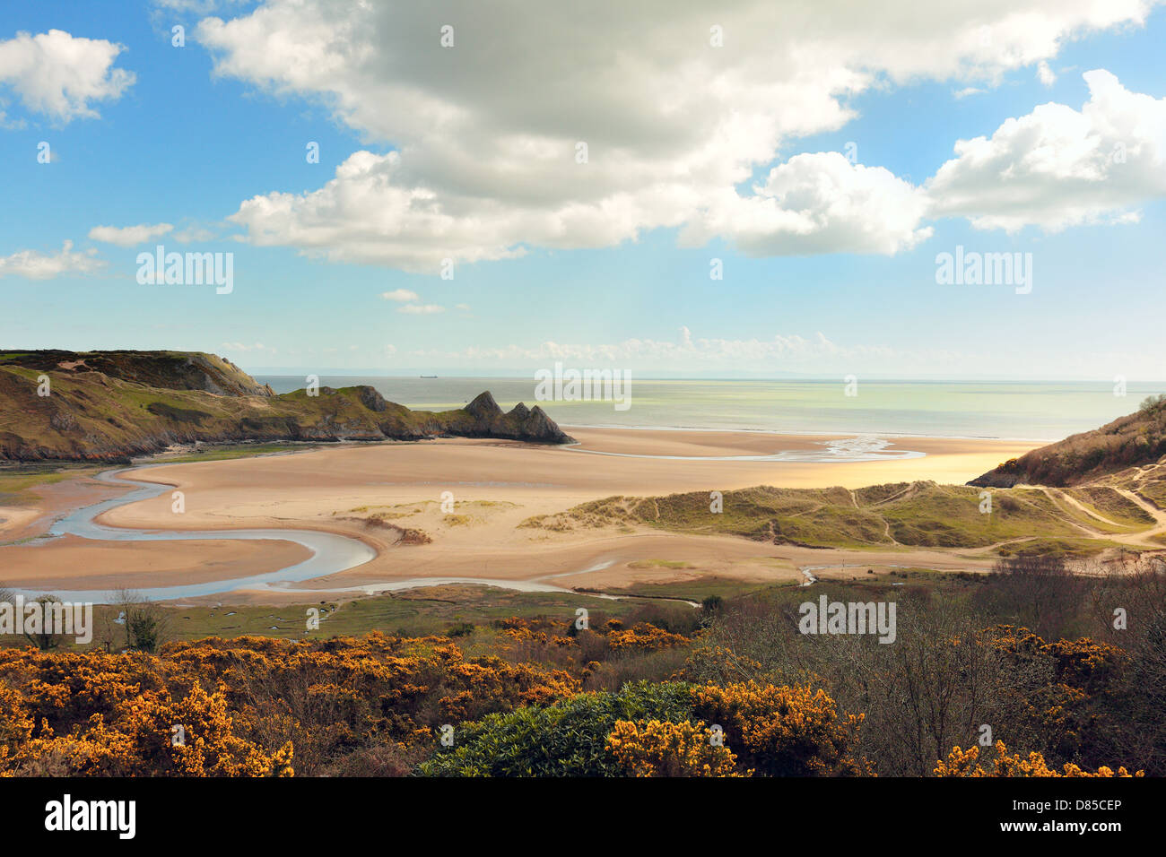 A view of Three Cliffs Bay on the Gower Peninsula in South Wales, UK ...