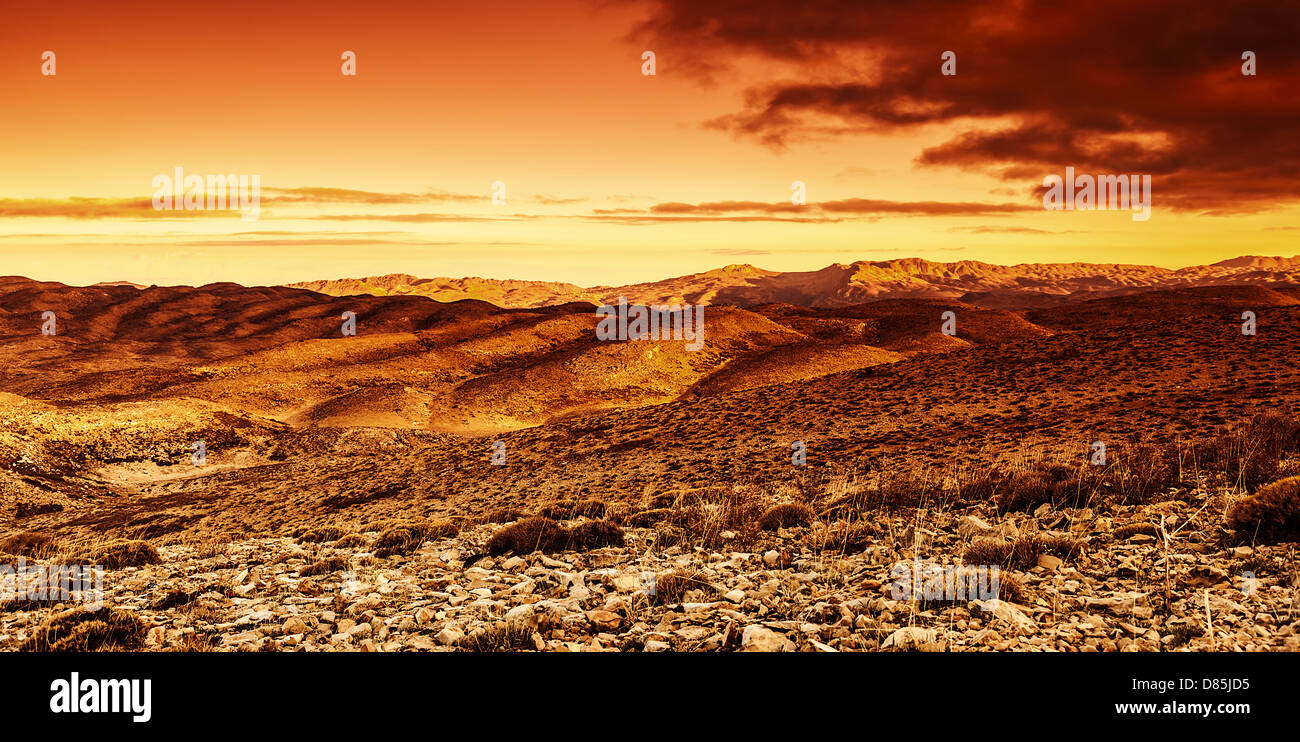 Photo of beautiful red dramatic sunset in desert, sandy mountains ...