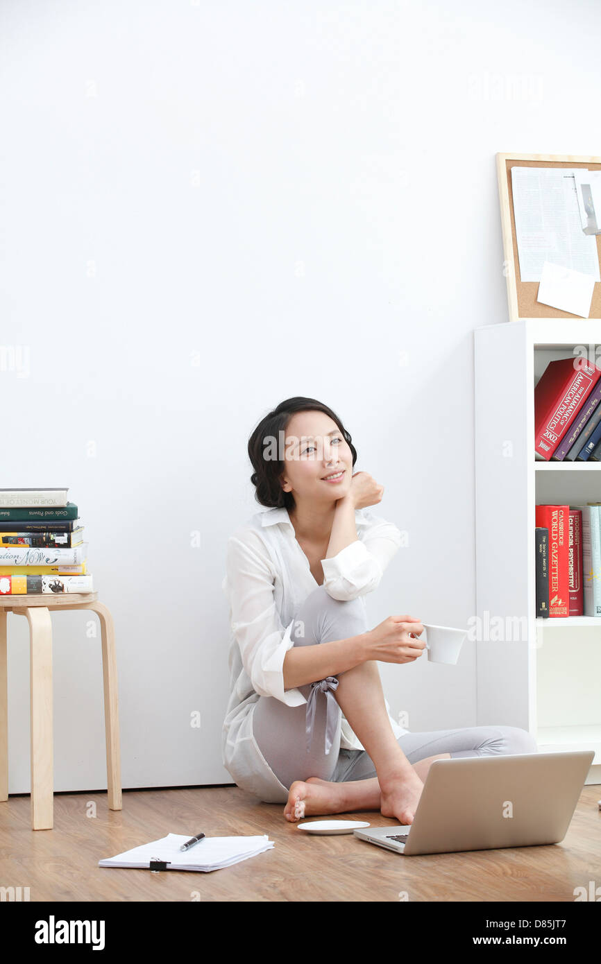 young woman sitting laptop computer Stock Photo - Alamy