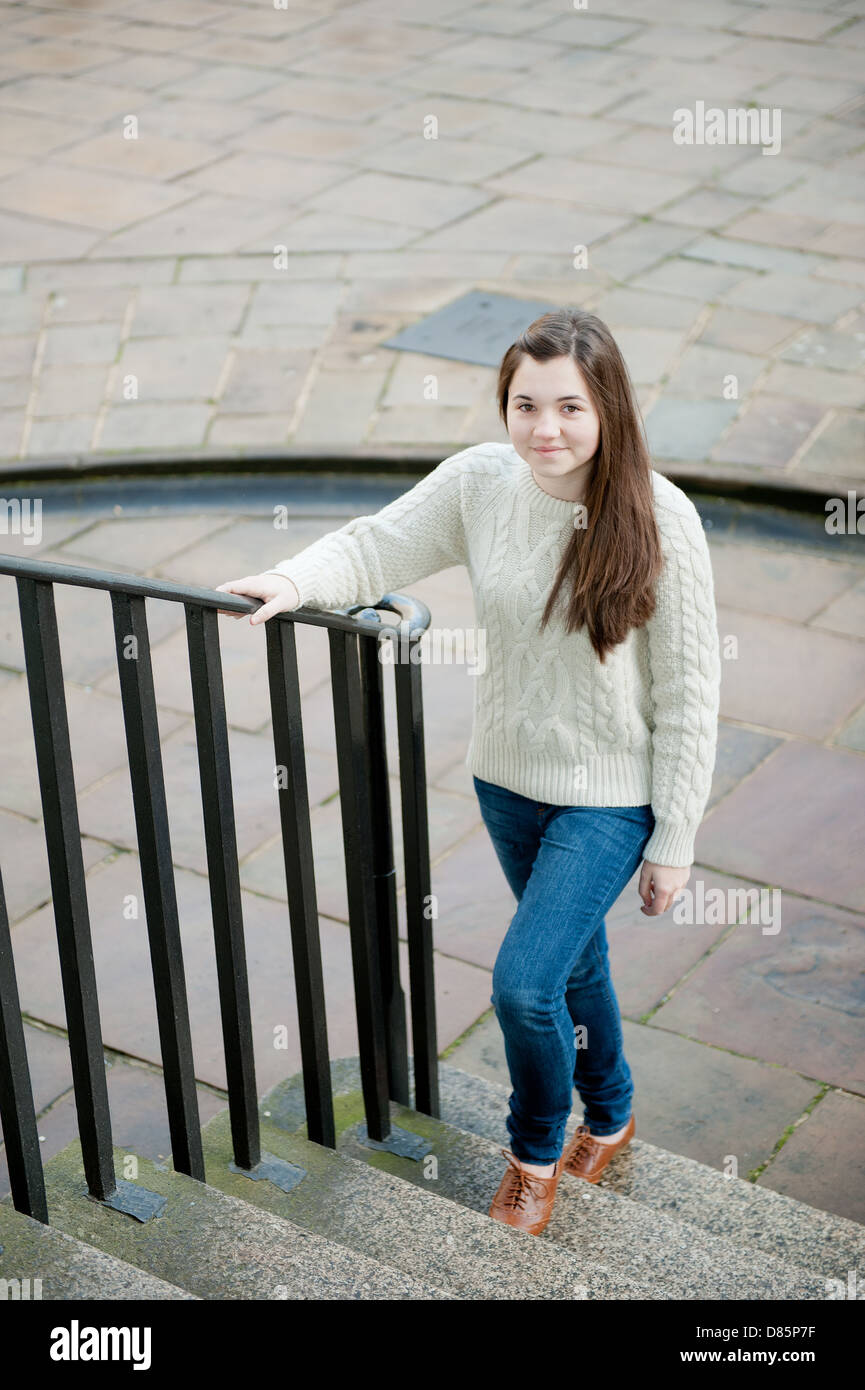 Teenage girl climbing outdoor steps Stock Photo - Alamy