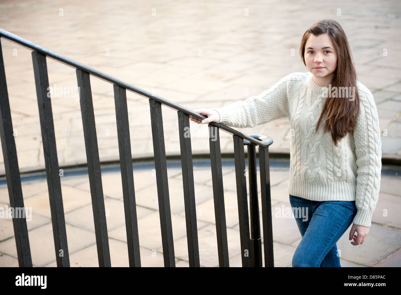 Teenage girl climbing outdoor steps Stock Photo - Alamy
