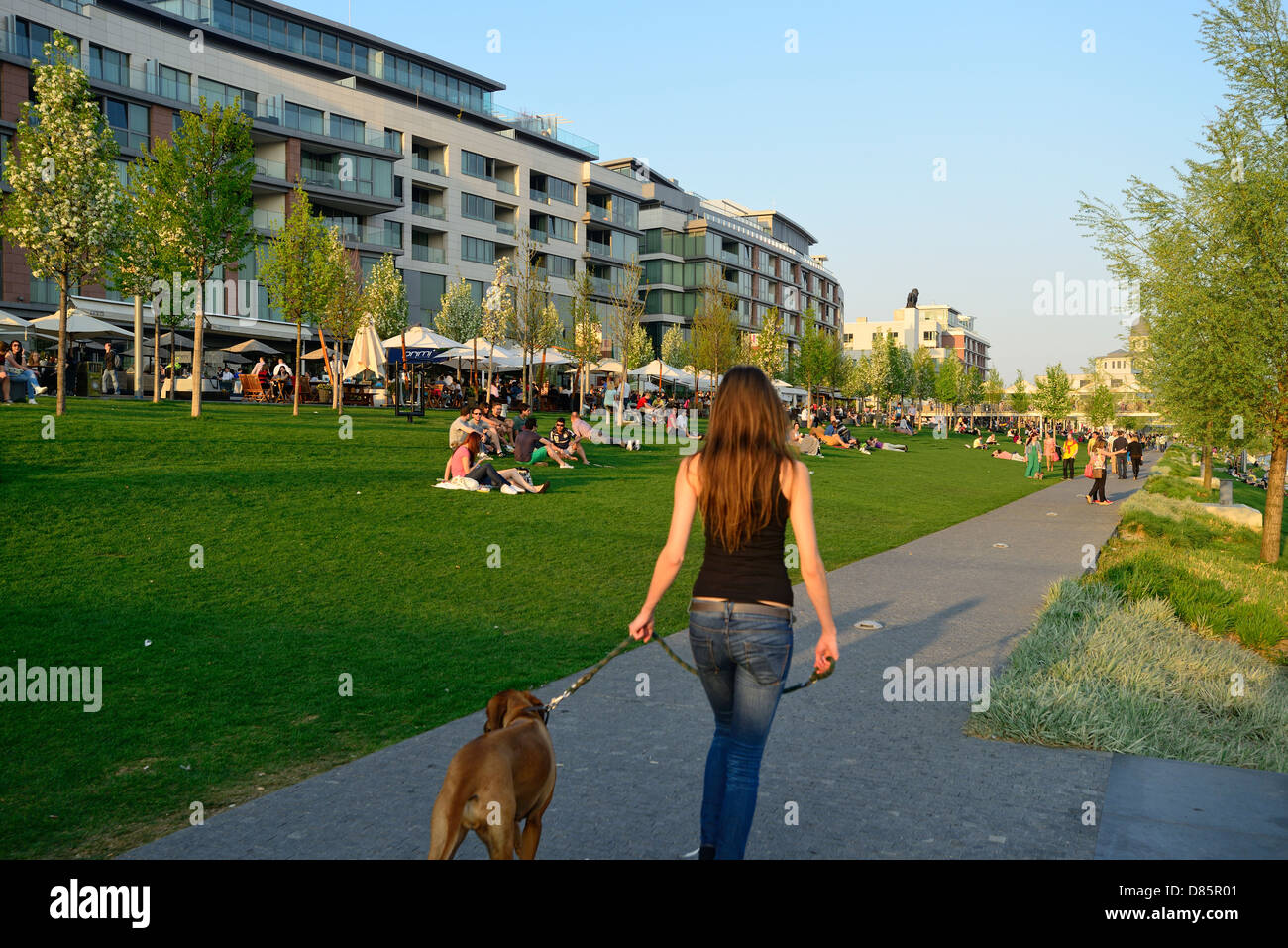 Eurovea shopping mall with rich green grass promenade along the River ...