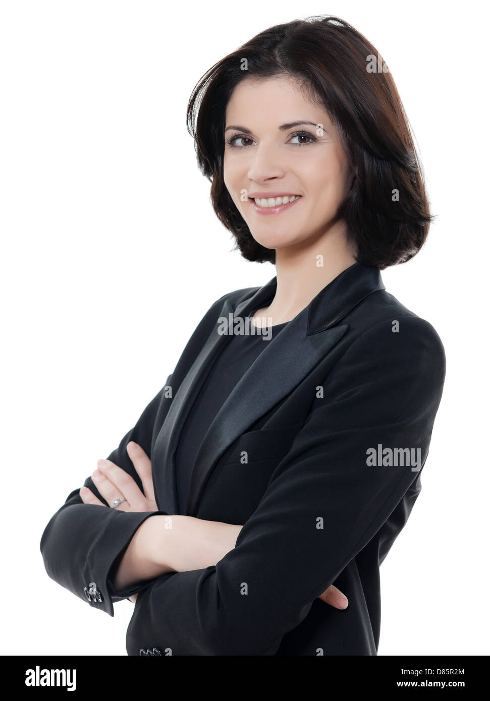 one beautiful smiling business woman portrait arms crossed in studio ...